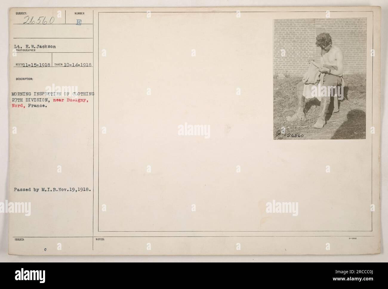 Soldiers of the 27th Division in France undergo a morning inspection of ...