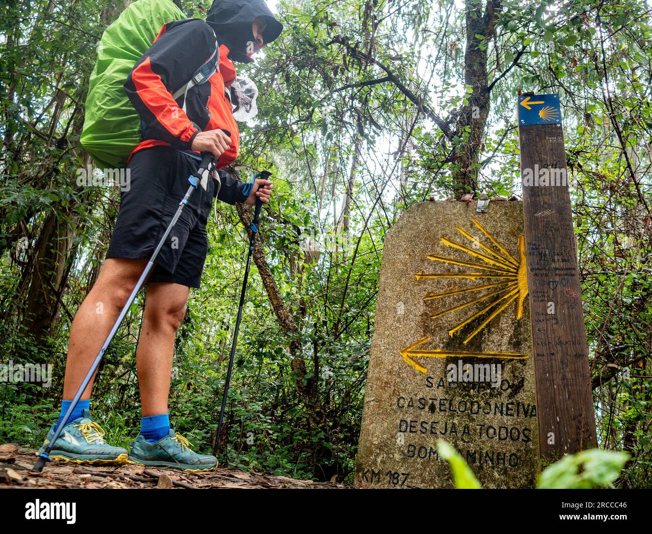 A pilgrim is seen taking a look at the big stone trademark. The Coastal ...