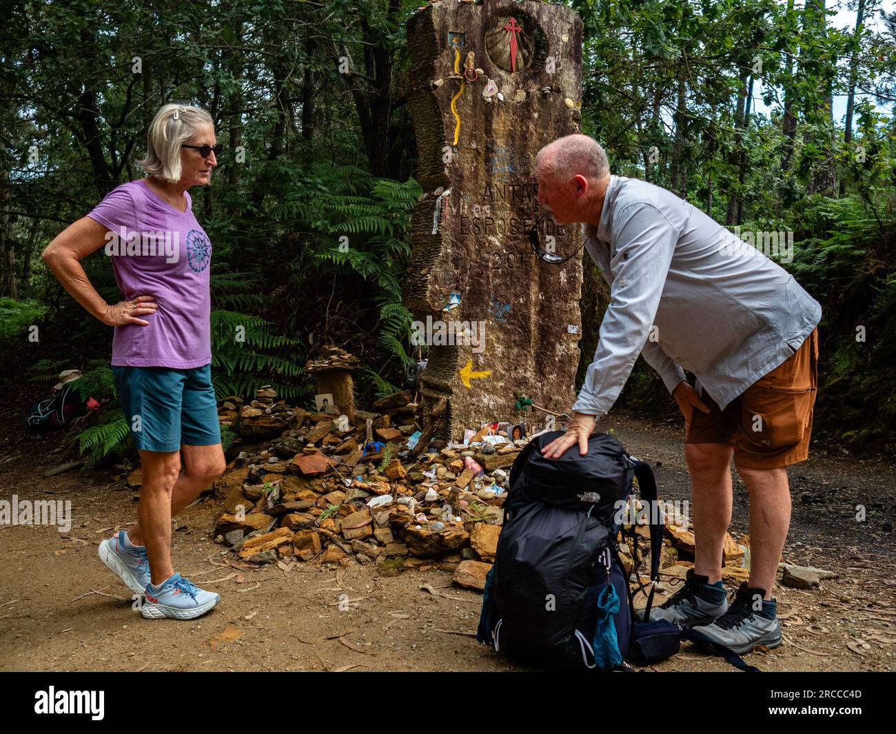 Two pilgrims are seen getting ready after a small break. The Coastal ...