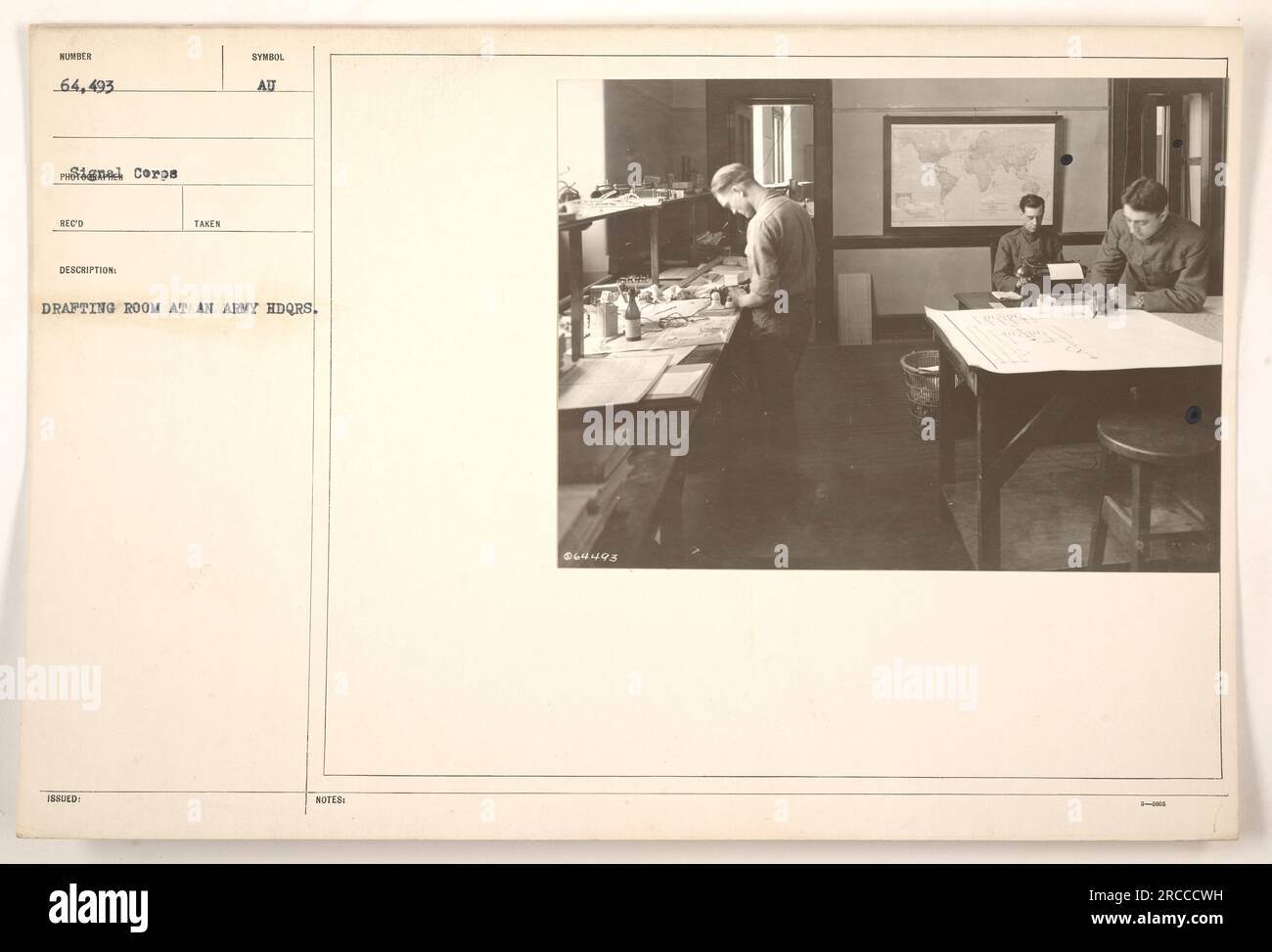 Caption: "Drafting room at an Army headquarters during World War I ...