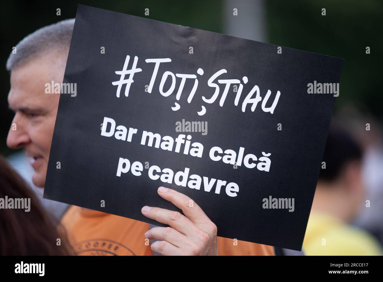 Bucharest, Romania. 13th July, 2023: A protester holds a placard that ...