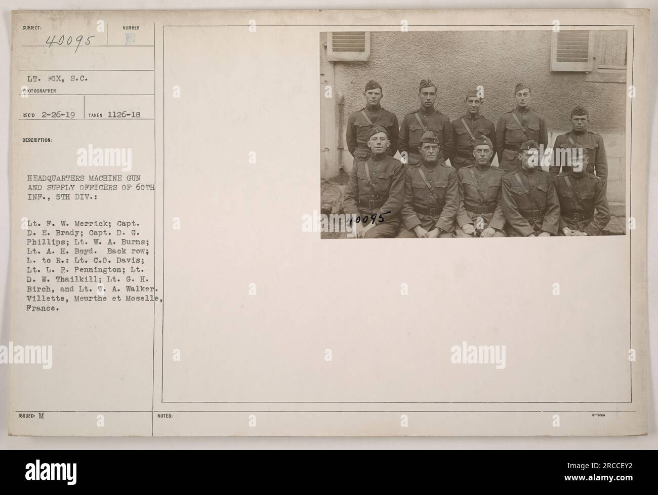 Front row, from left to right: Lt. F. W. Merrick, Capt. D. E. Brady ...