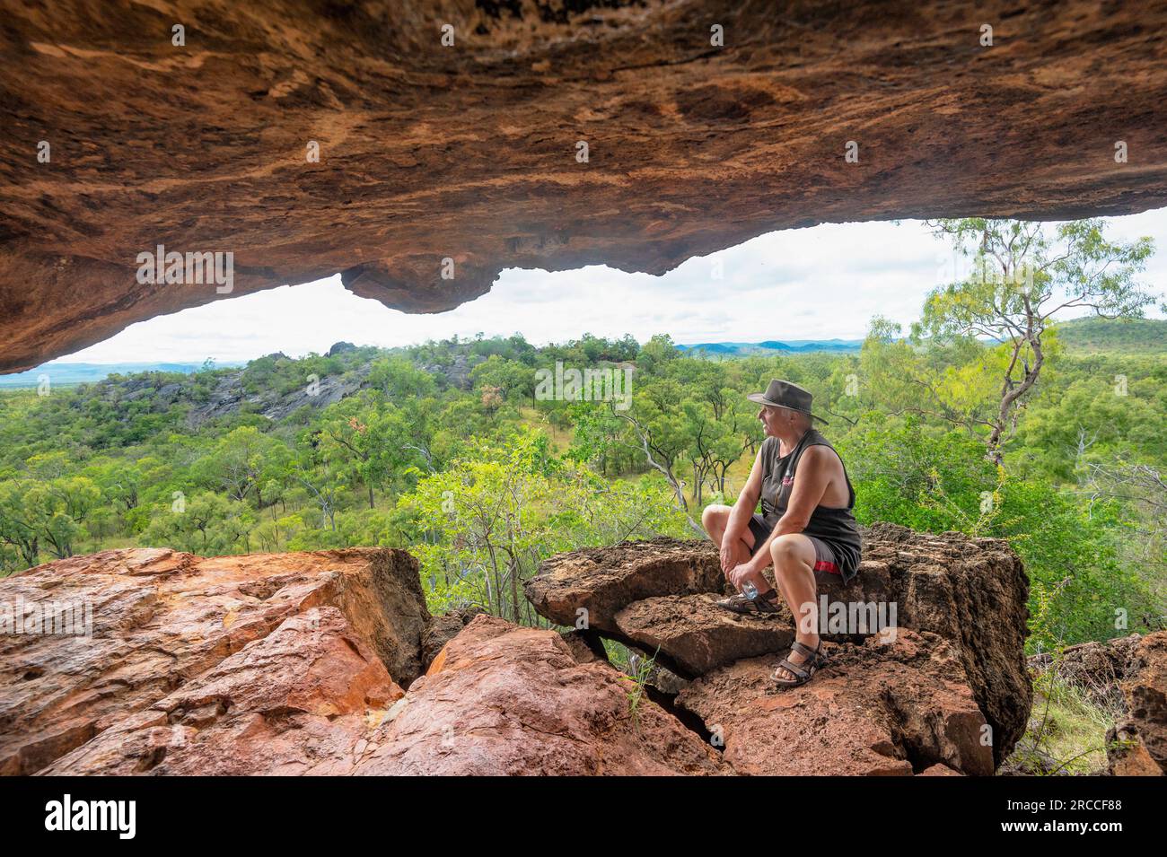 Tourist admiring the scenery among eroded limestone cliffs at The ...