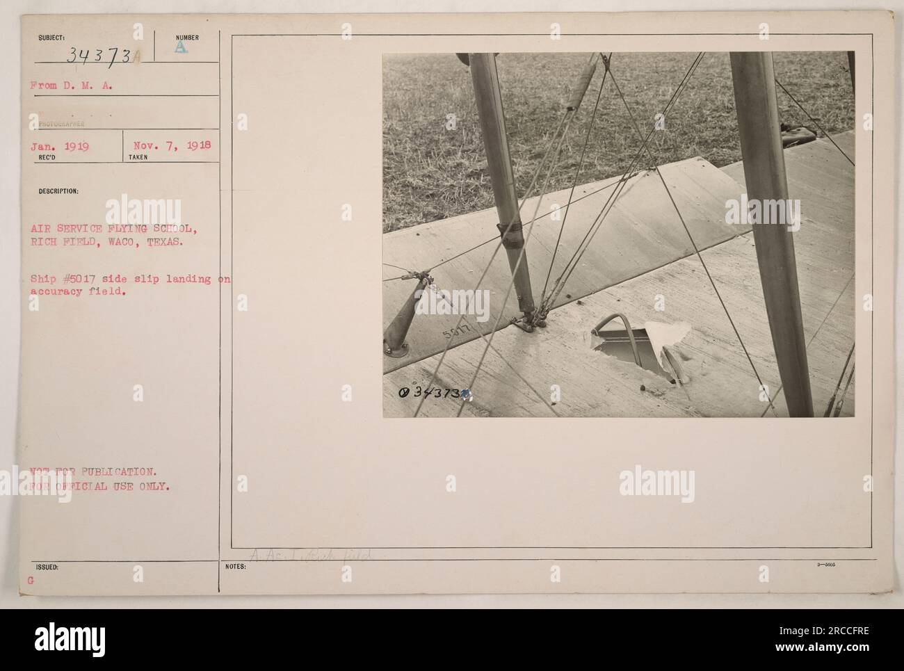 An airplane (#5017) performs a side slip landing on the accuracy field ...