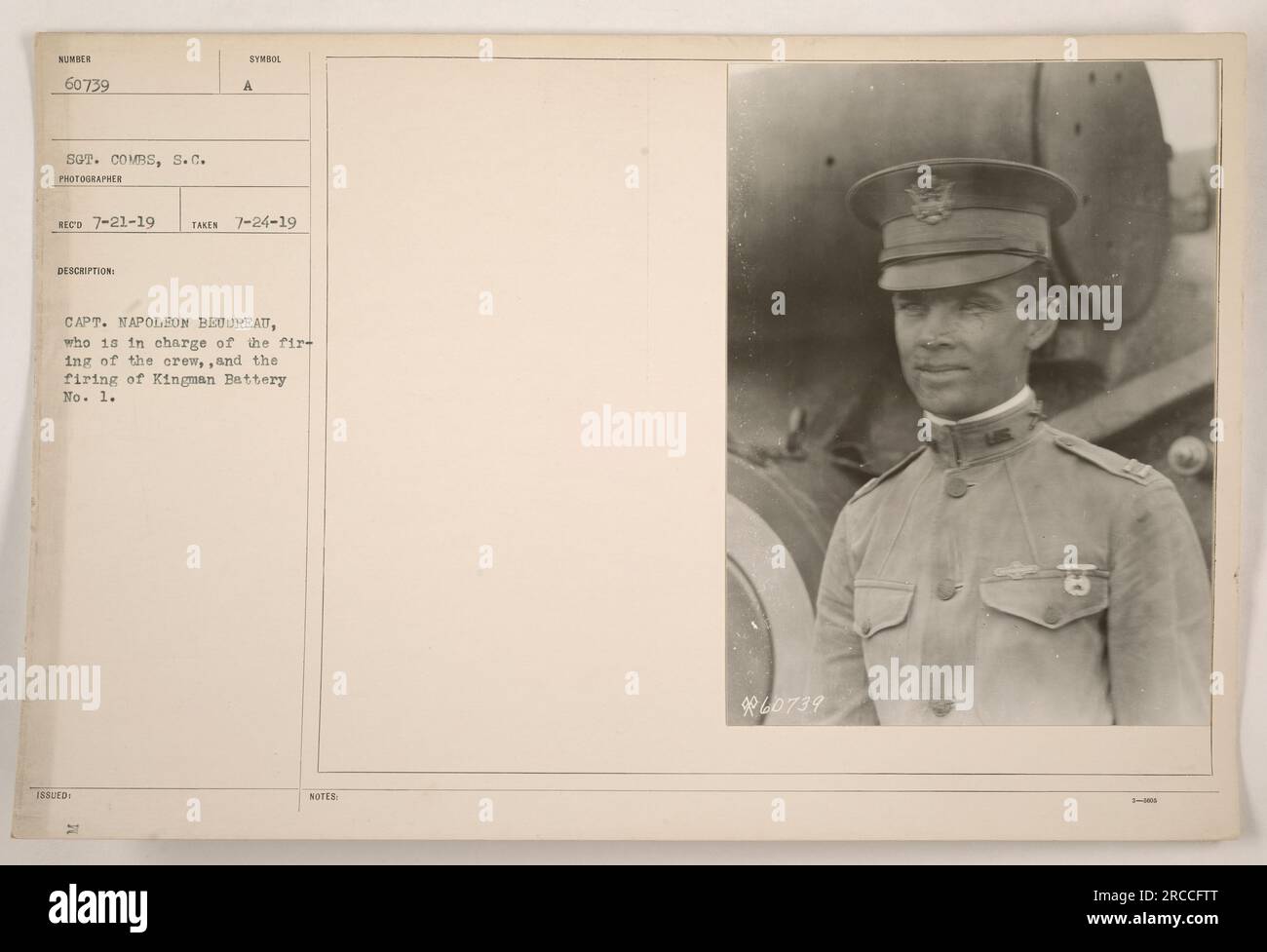 Caption: Capt. Napoleon Beudreau, in charge of crew firing and Kingman ...