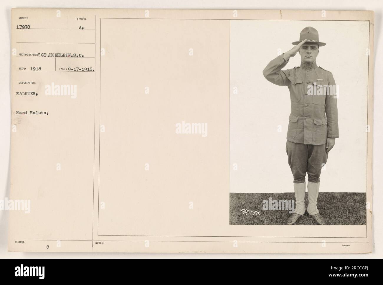 Soldiers on an American military base in 1918 performing a hand salute ...