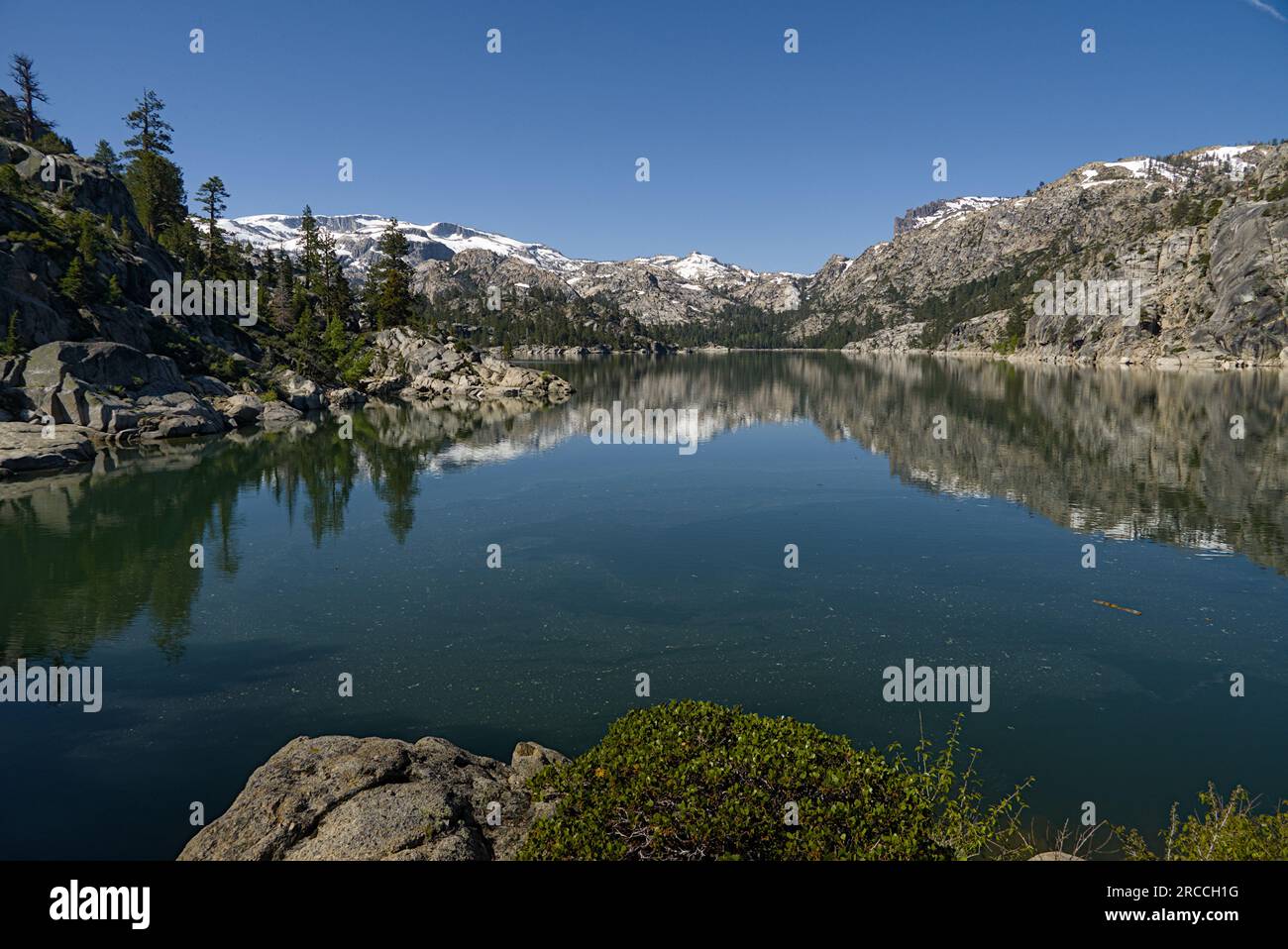 Alpine mountain and it's reflection in the alpine lake in Emigrant ...
