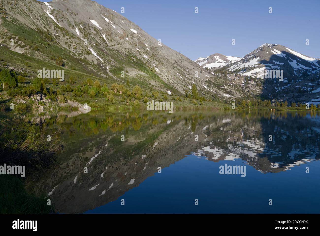 Alpine mountain and it's reflection in the alpine lake in Emigrant ...