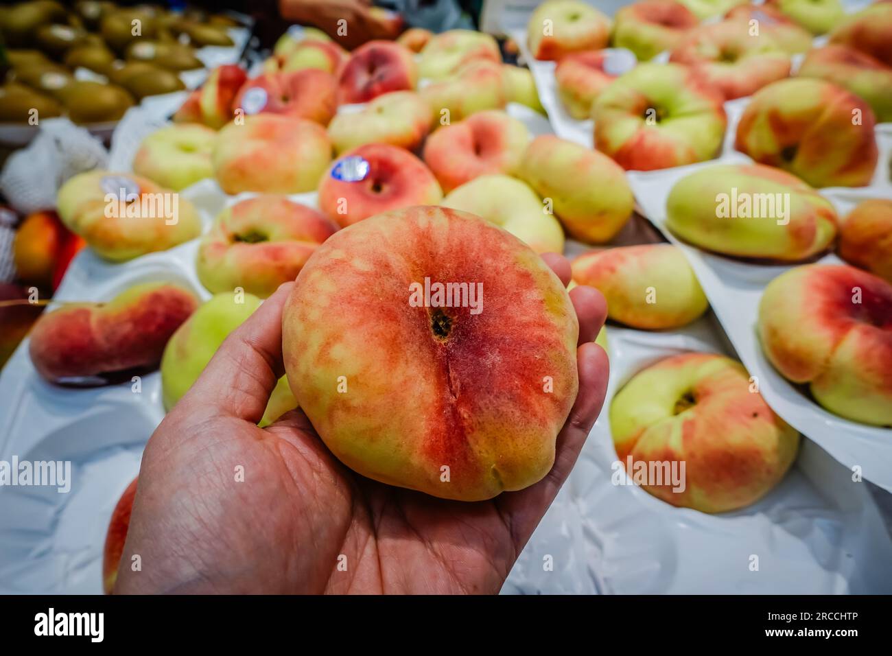 The donut peach, also known as the Saturn peach, is a delightful and ...