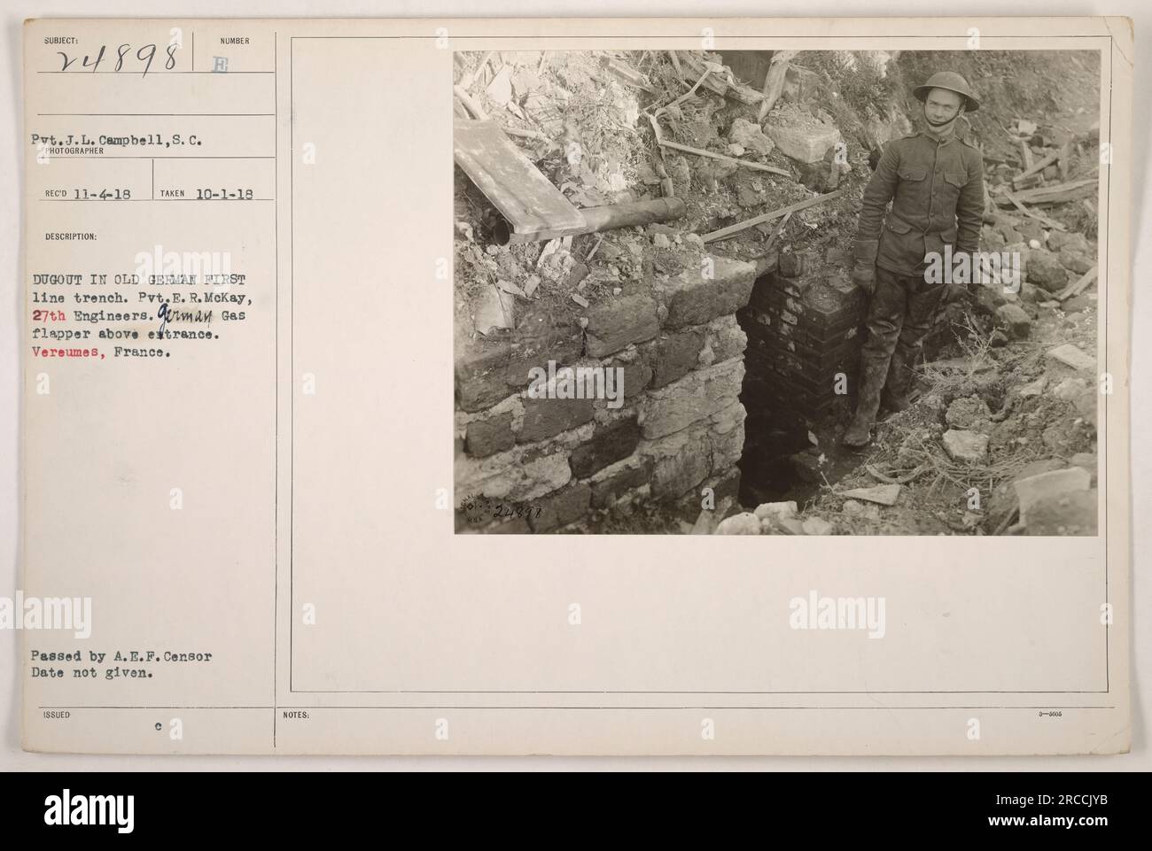 Pvt.J.L. Campbell, S.C., is photographed inside an old German first ...