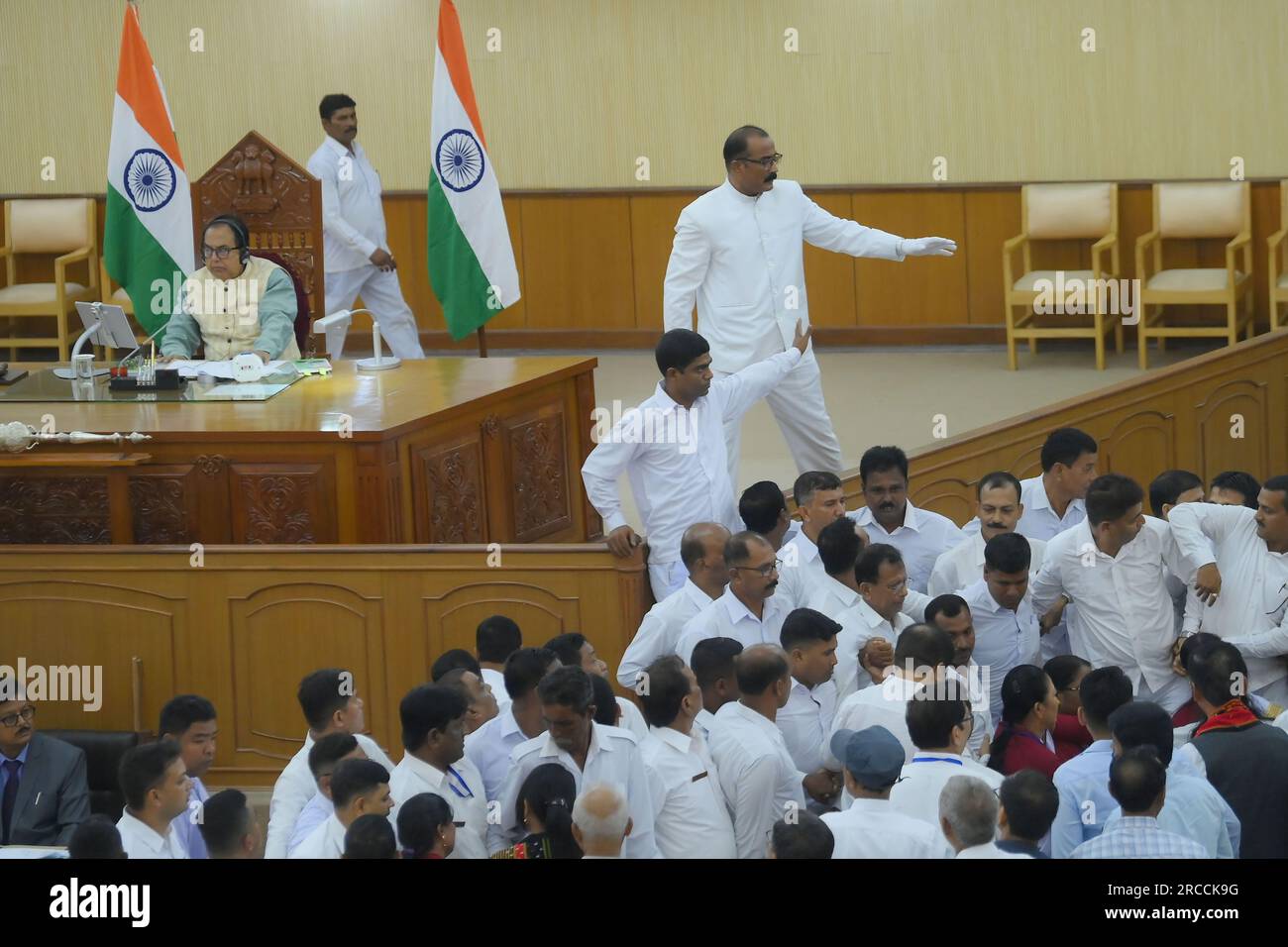 Congress MLA Sudip Roy Barman, spreading holy water in the assembly before the start of the ...