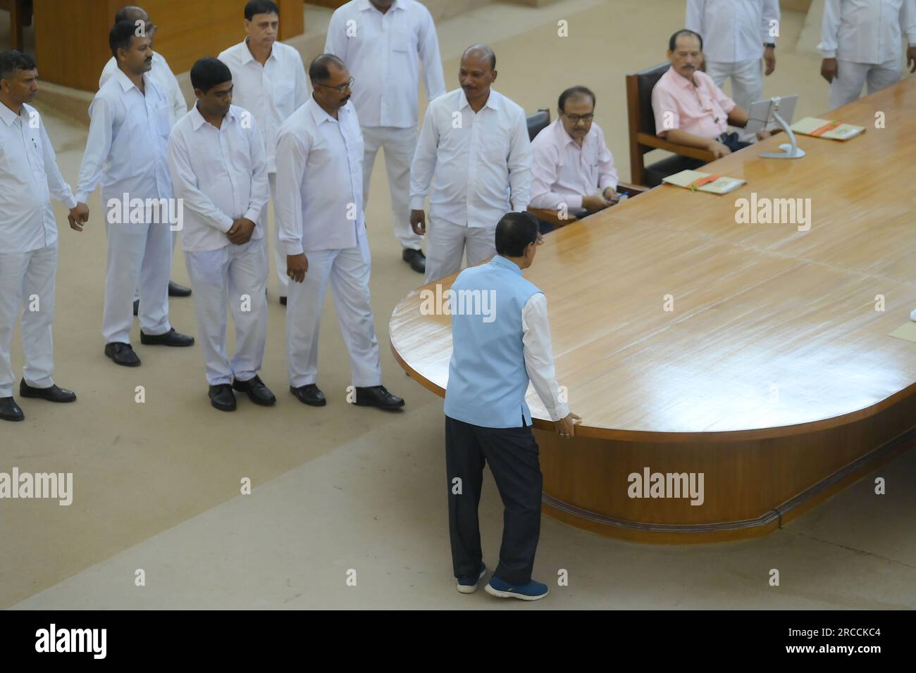 Congress MLA Sudip Roy Barman, spreading holy water in the assembly before the start of the ...