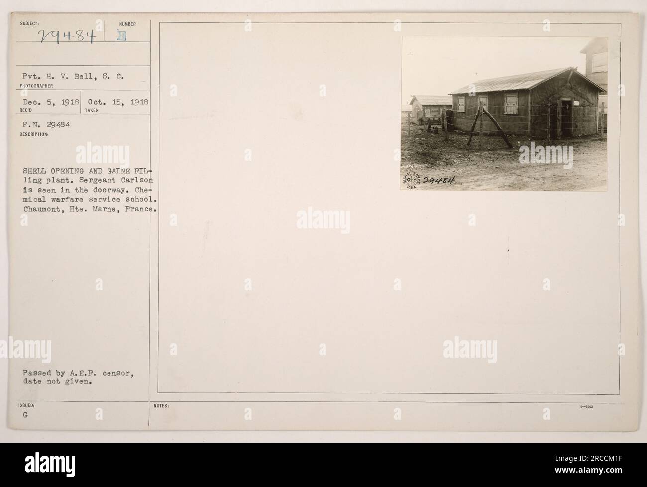 Pvt. H. V. Bell of the 8th Cavalry is pictured at a shell opening and ...