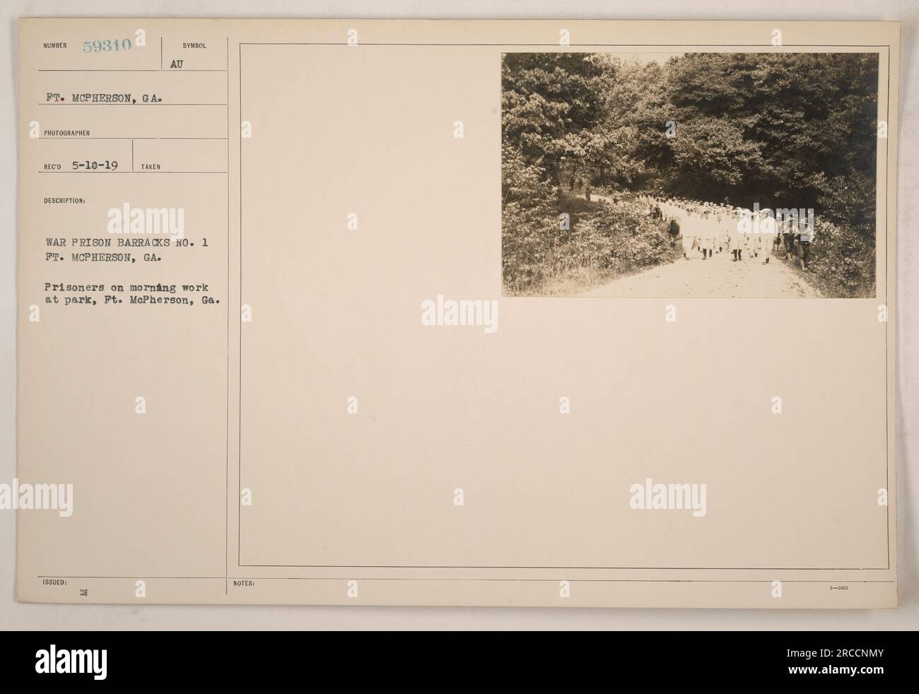 Prisoners take their morning walk at the park in War Prison Barracks No ...