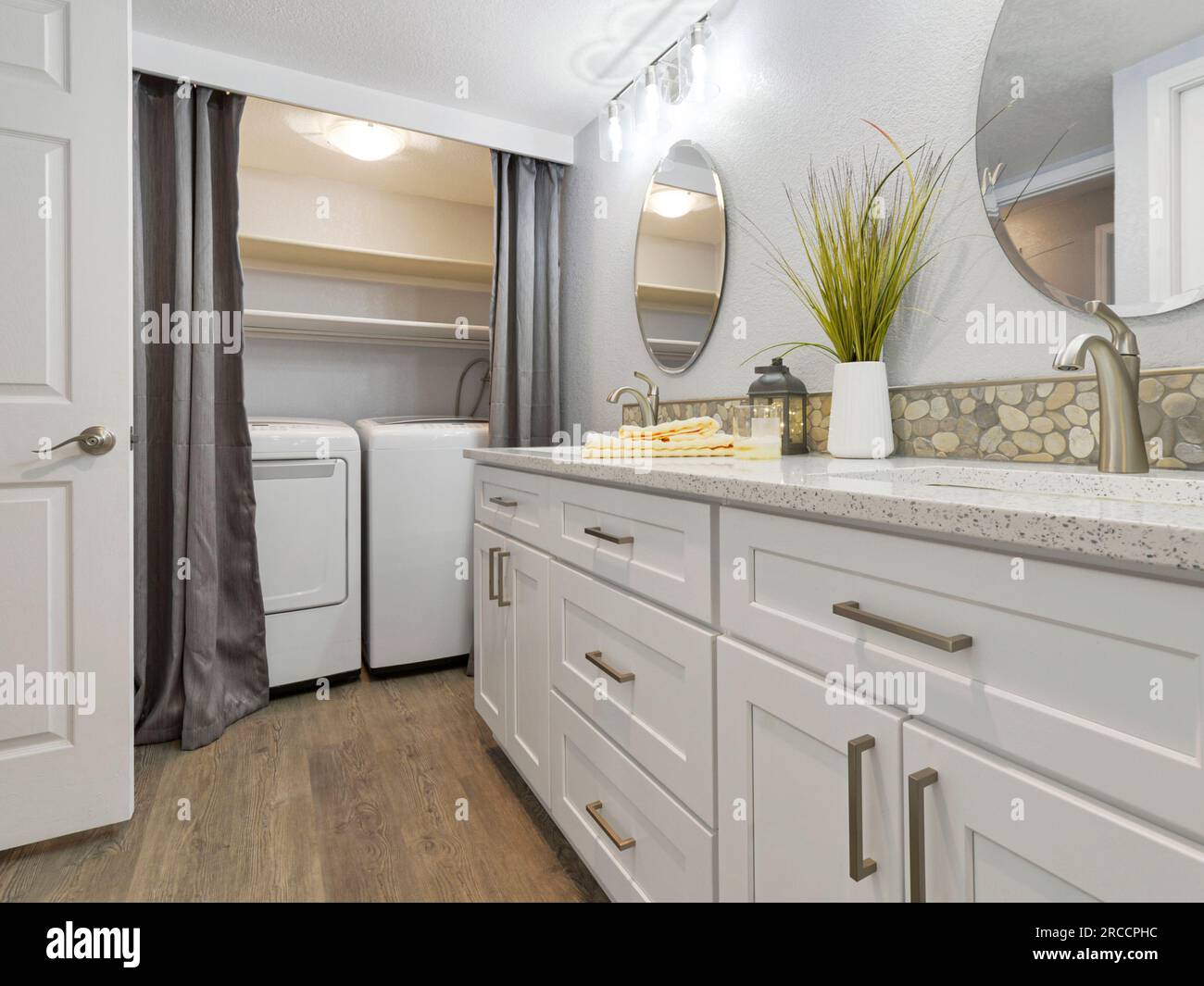 Modern residential bathroom and laundry room interior Stock Photo - Alamy