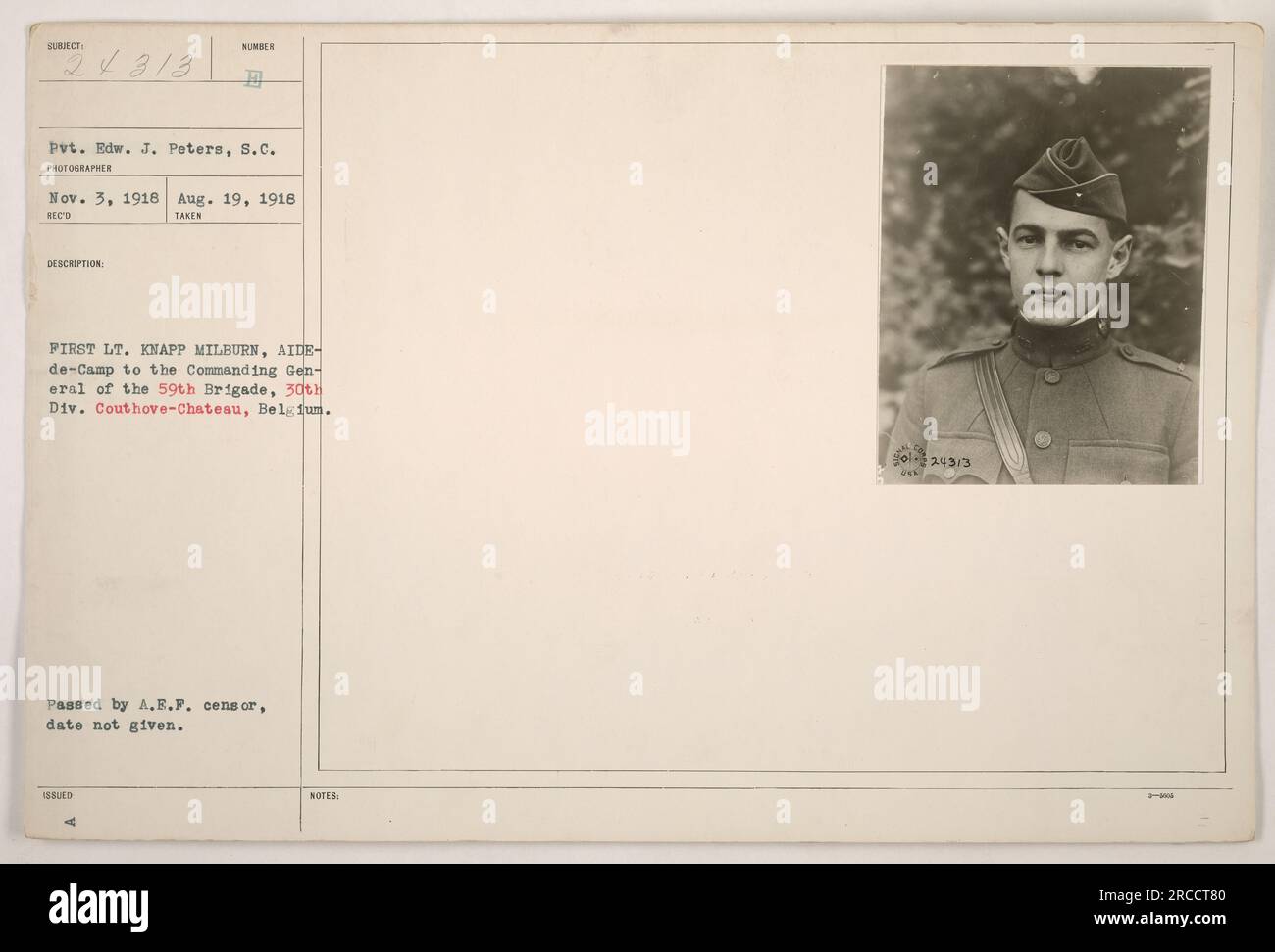 Pvt. Edw. J. Peters, S.c., takes a photograph of First Lt. Knapp ...