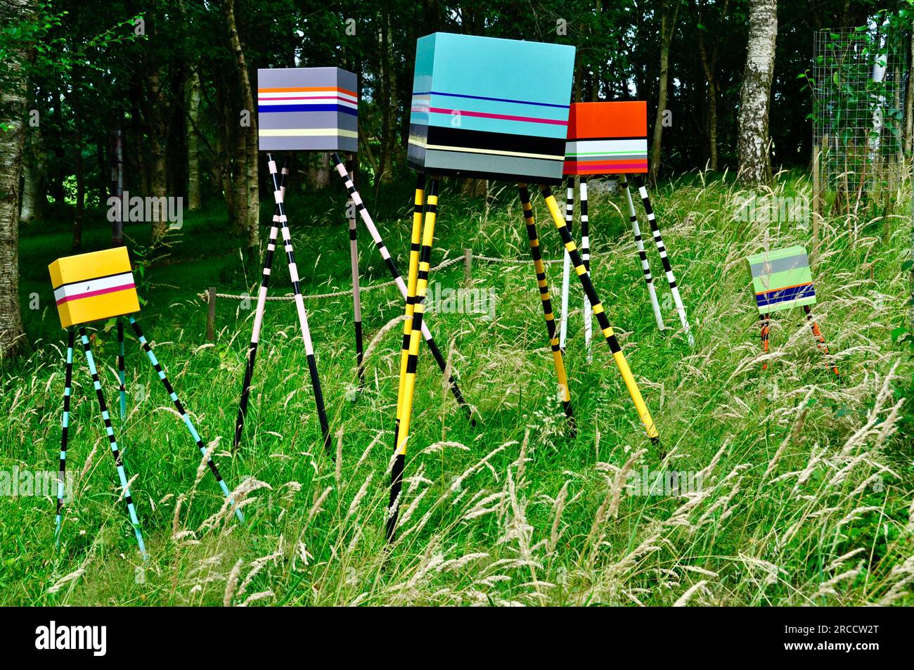 John Elliot - Picnic - Brightly coloured cuboid objects on legs Stock ...