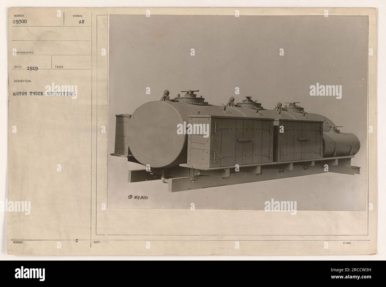 Soldiers unloading supplies from a motor truck during World War One ...