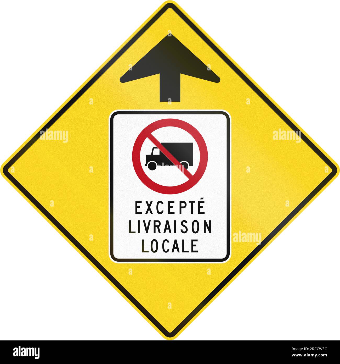 Warning road sign in Quebec, Canada - Lorry prohibition ahead. The text ...