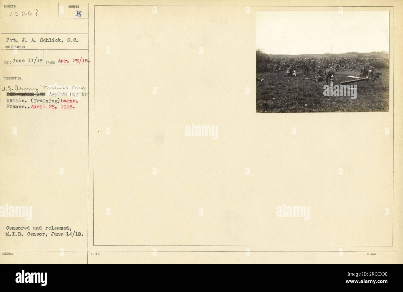 Pvt. J. A. Schlick, S.C., a U.S. Army medical personnel, is seen ...