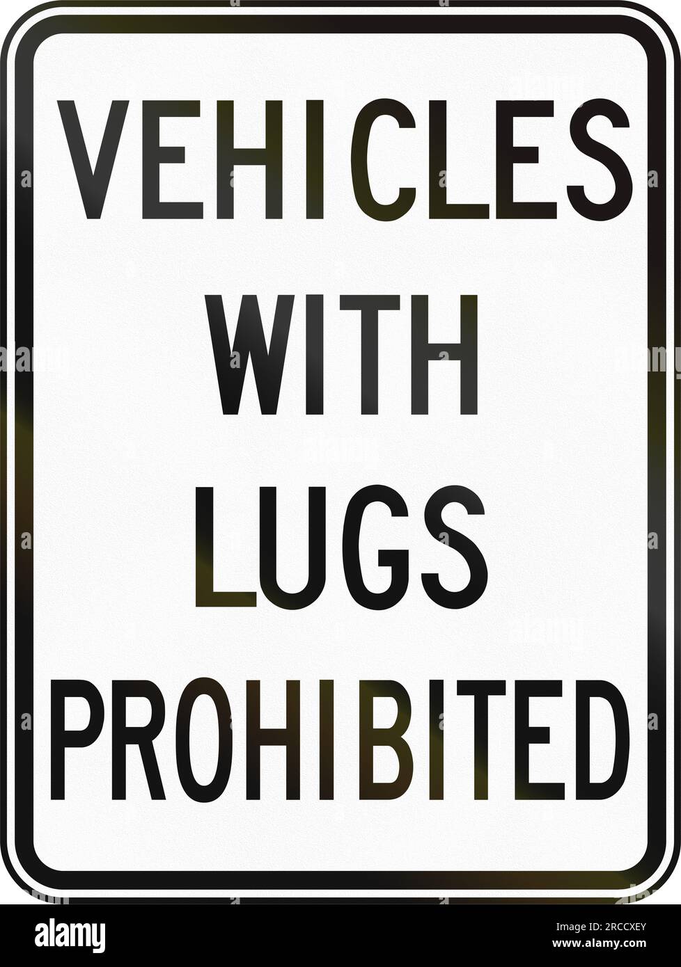 Regulatory sign in Canada - Vehicles with lugs prohibited. This sign is ...