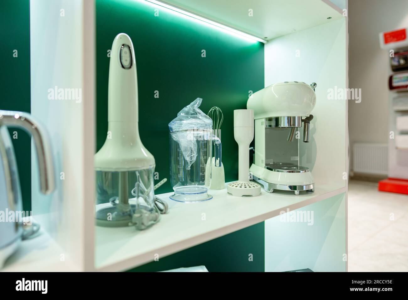 Small kitchen appliances on the shelf in a store Stock Photo - Alamy