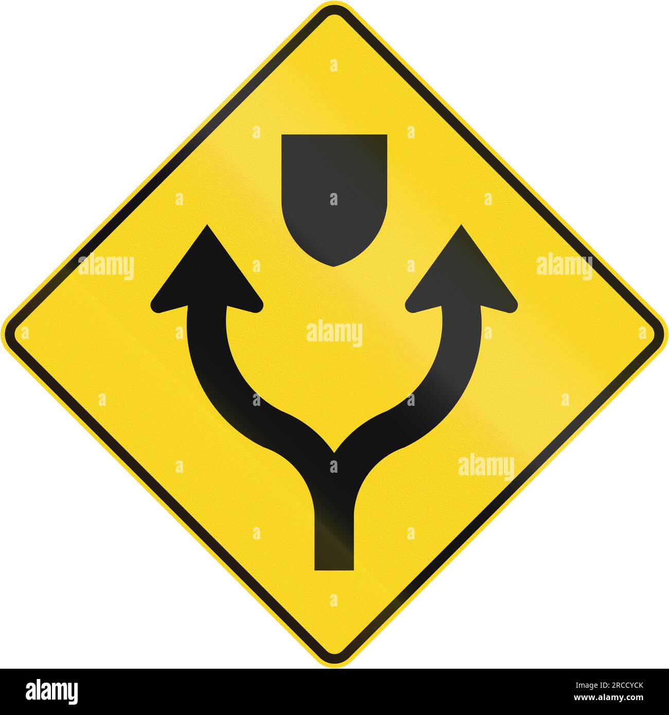 Warning road sign in Canada - pass left or right ahead. This sign is ...