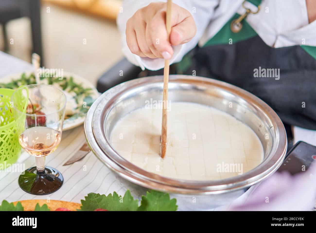 Master class and cheese tasting. Women make cheese. The enzyme and ...