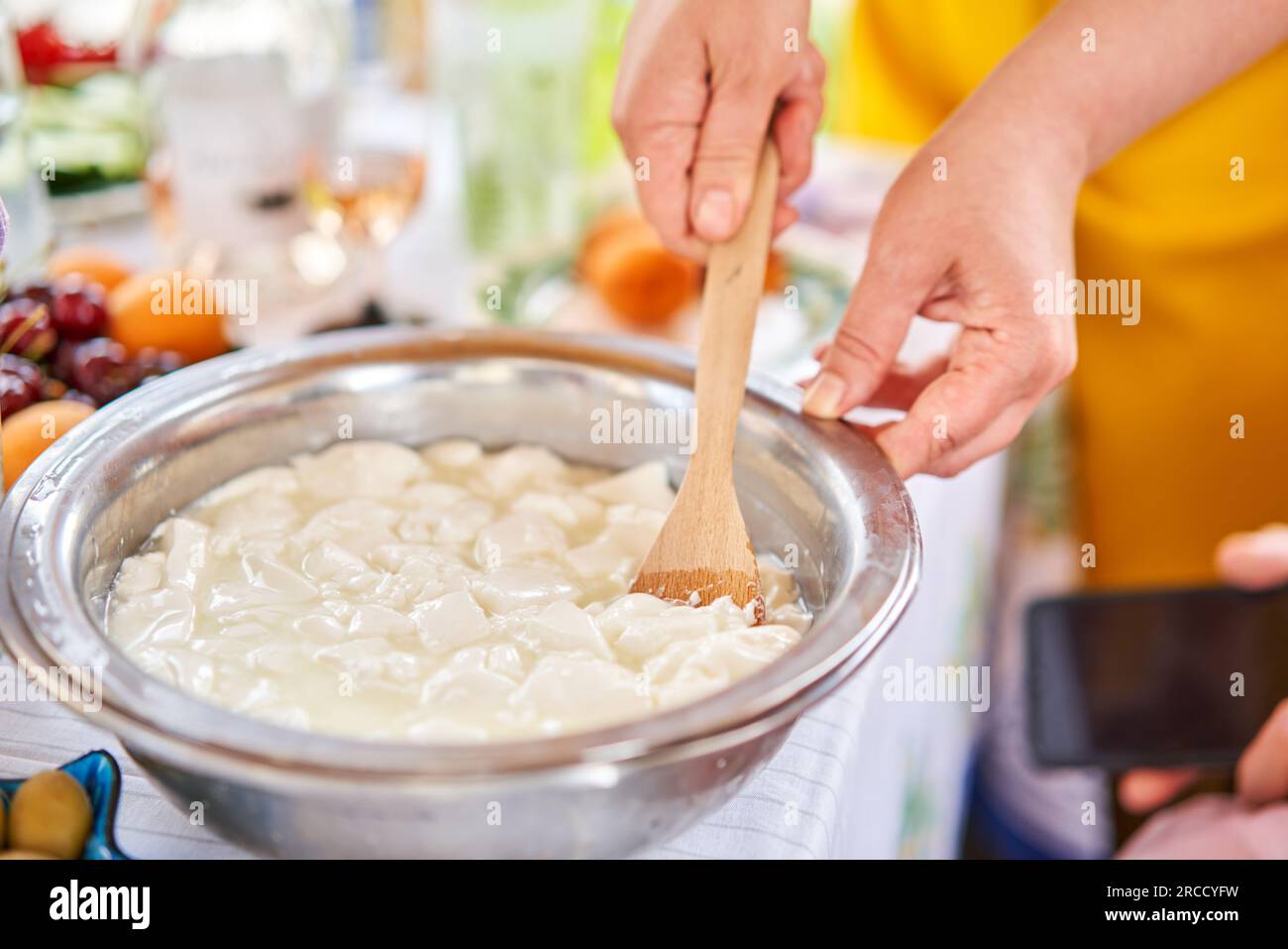 Master class and cheese tasting. Women make cheese. The enzyme and ...