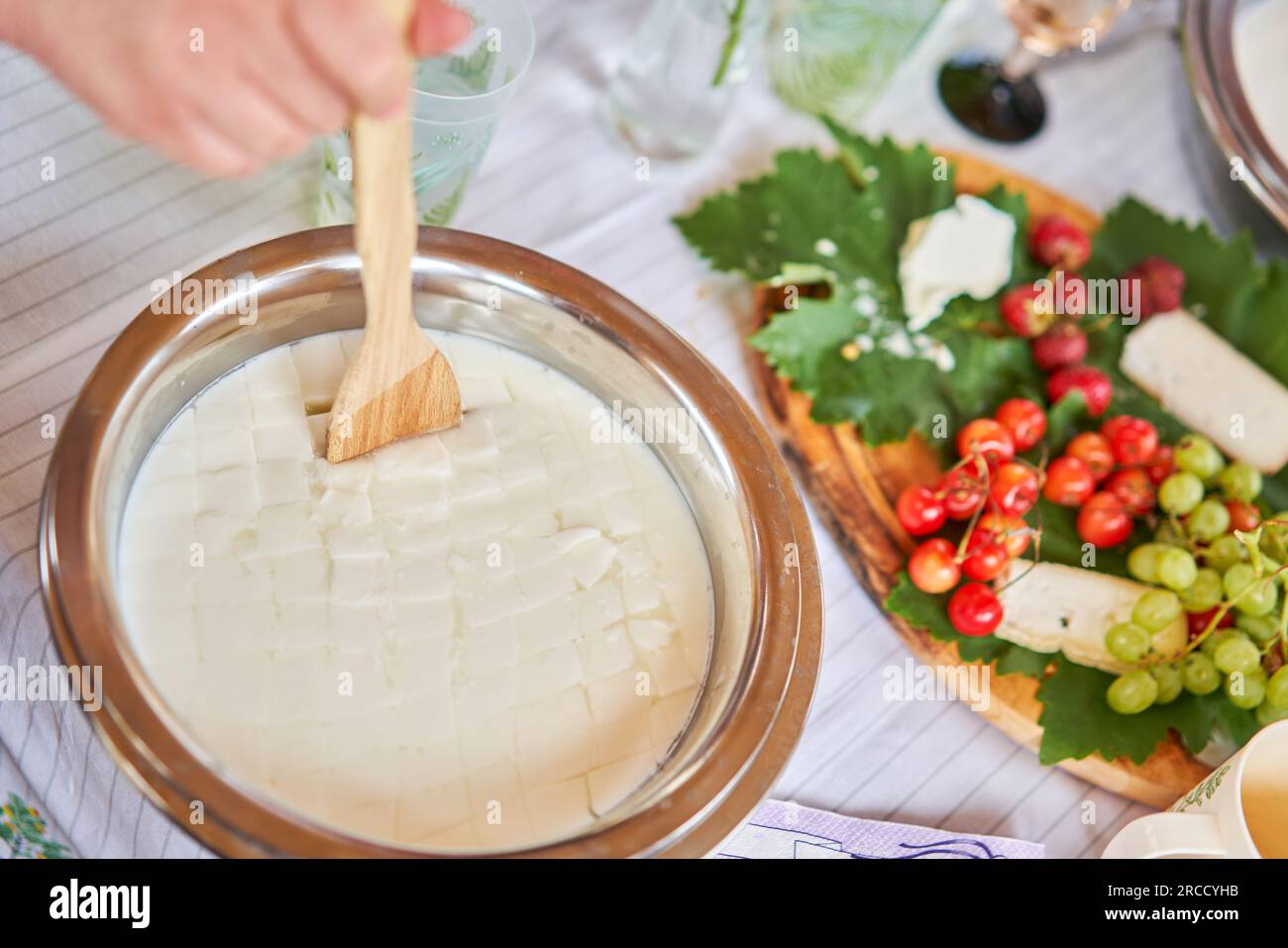 Master class and cheese tasting. Women make cheese. The enzyme and ...