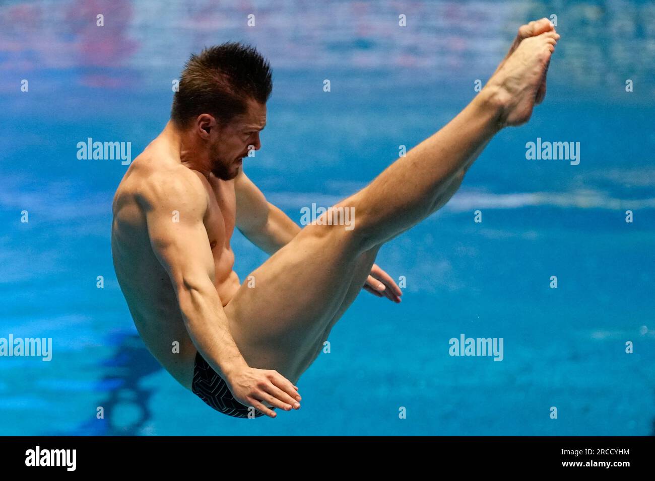 Andrzej Rzeszutek of Poland competes in the 1m Springboard Men at the ...