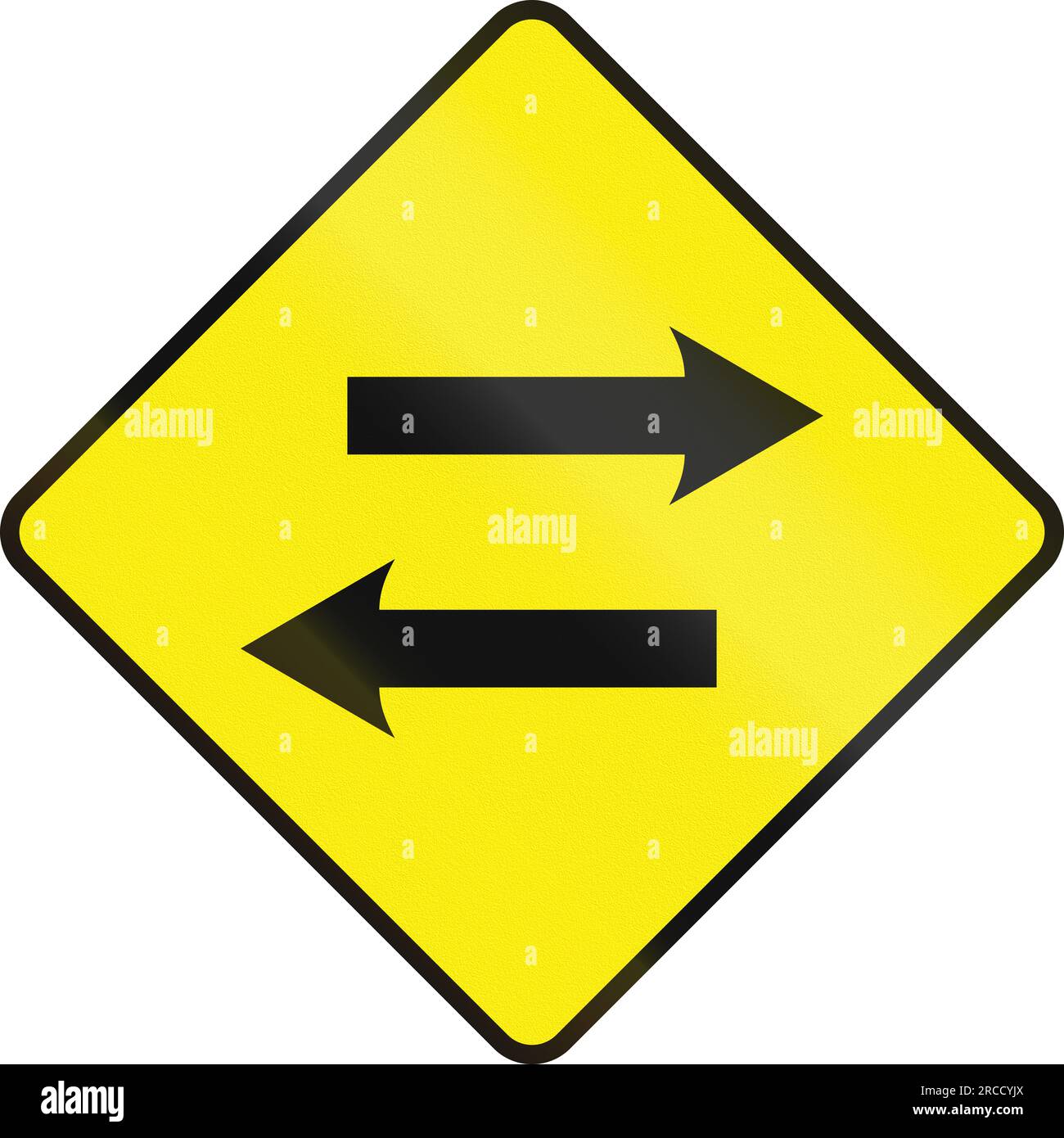 Warning road sign in Ireland: Opposing traffic ahead Stock Photo - Alamy