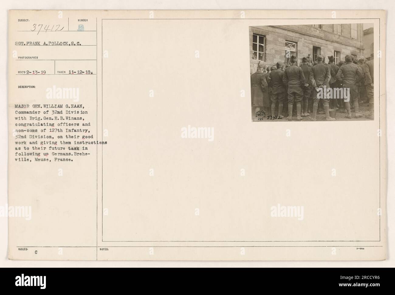 Major General William G. Haan, Commander of the 32nd Division, is seen ...