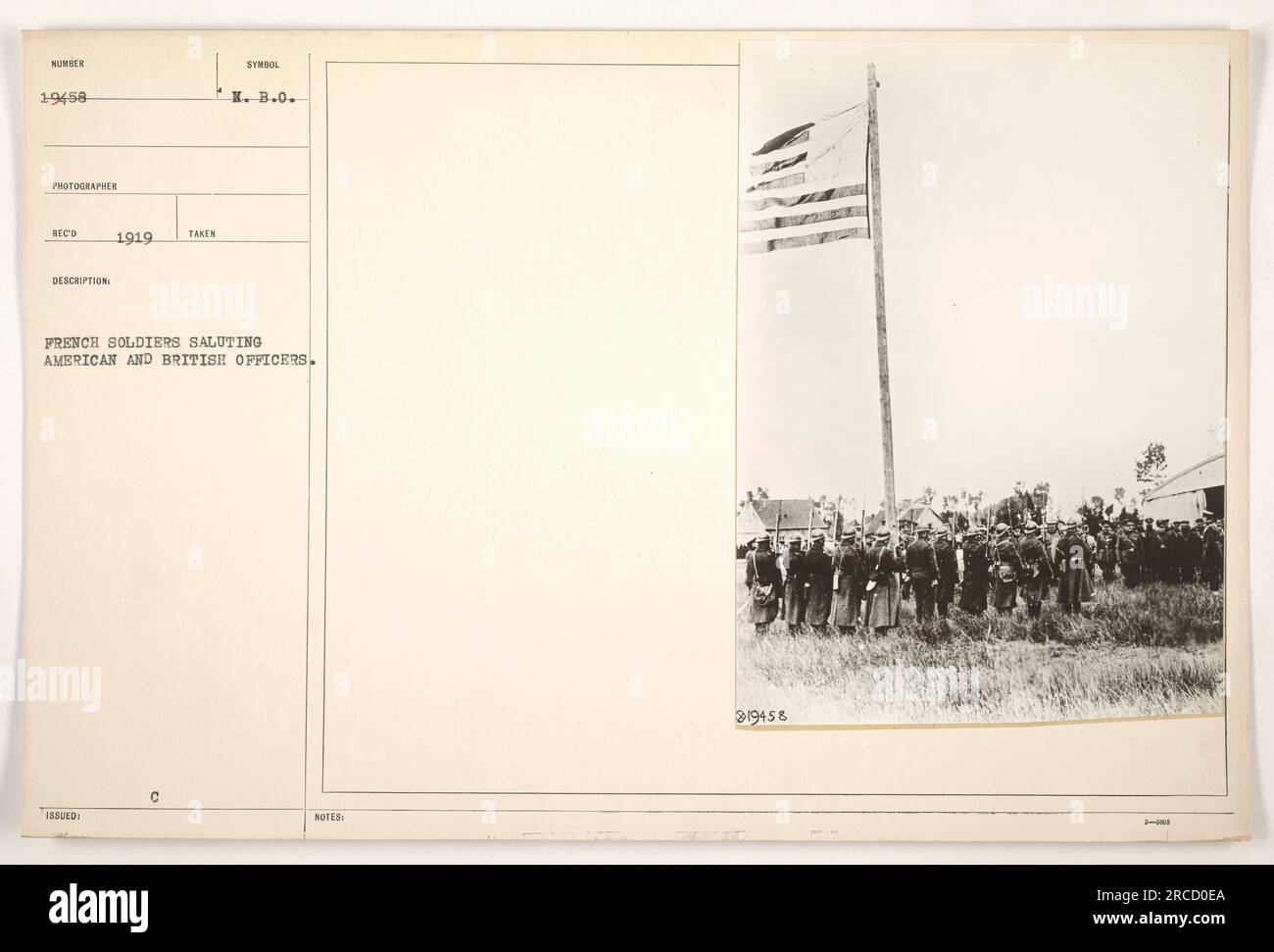 French soldiers salute American and British officers in this photograph ...