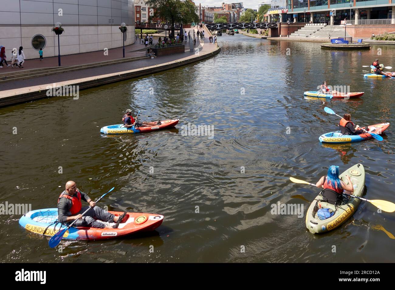 Kayaking on the canal at Brindley Place, Birmingham canal, England, UK ...