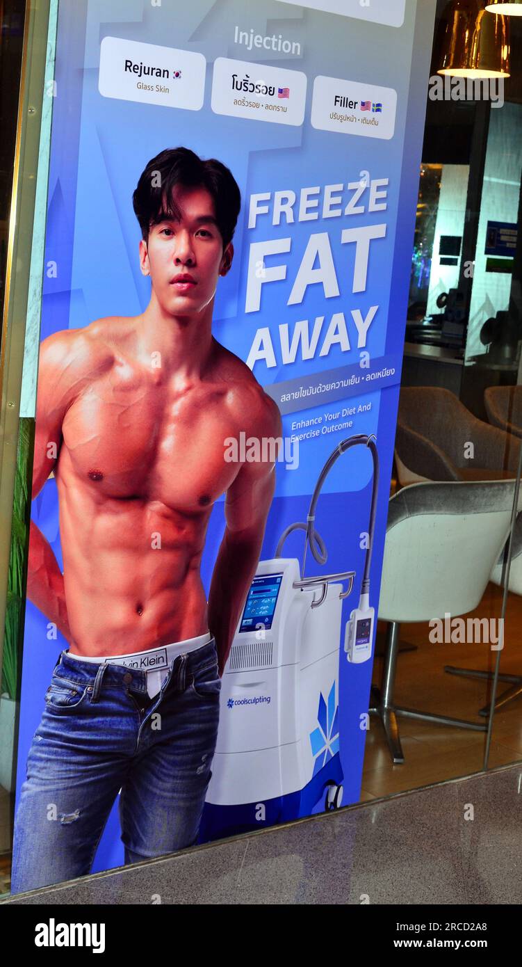 Image of a handsome muscled, shirtless, young man with a 6 pack stomach ...