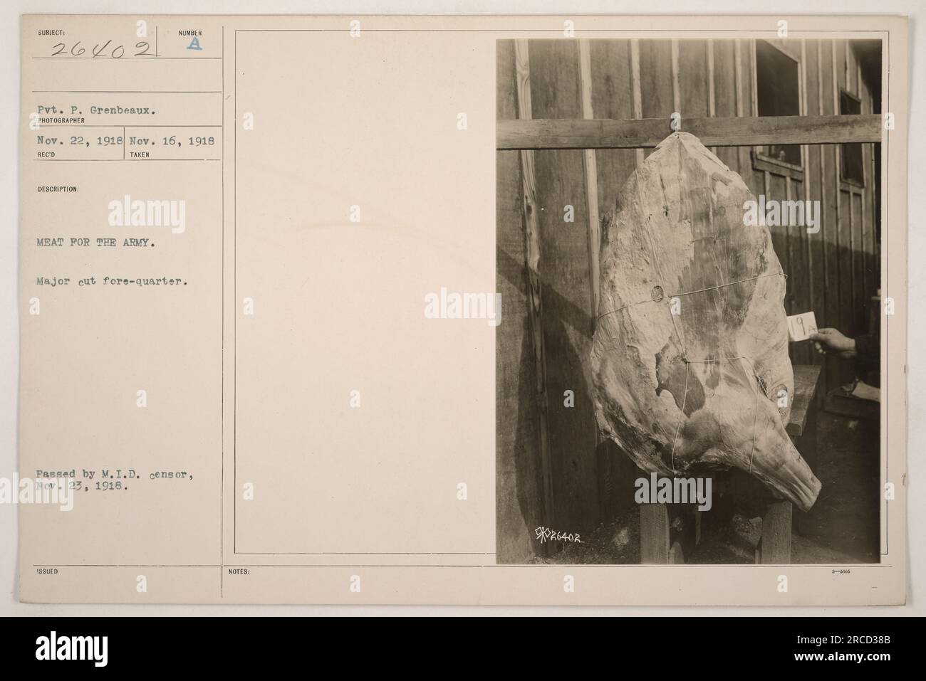 Image depicting Pvt. P. Grenbeaux preparing meat for the army during ...