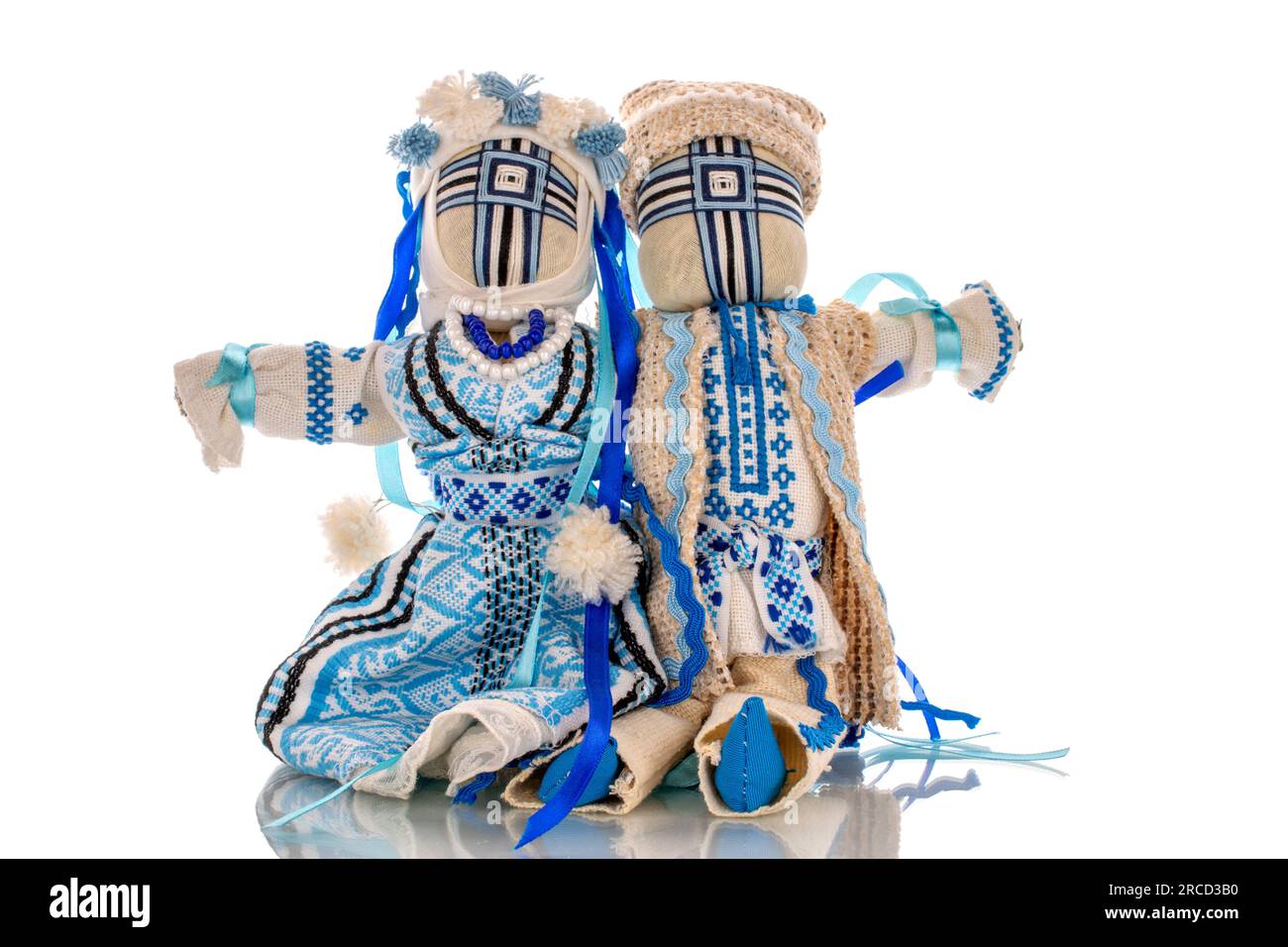 Ukrainian folk doll-motanka, macro, isolated on a white background ...