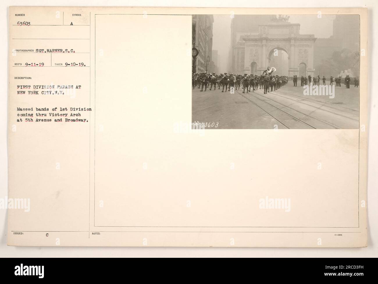 The image shows the First Division parade in New York City. The massed ...