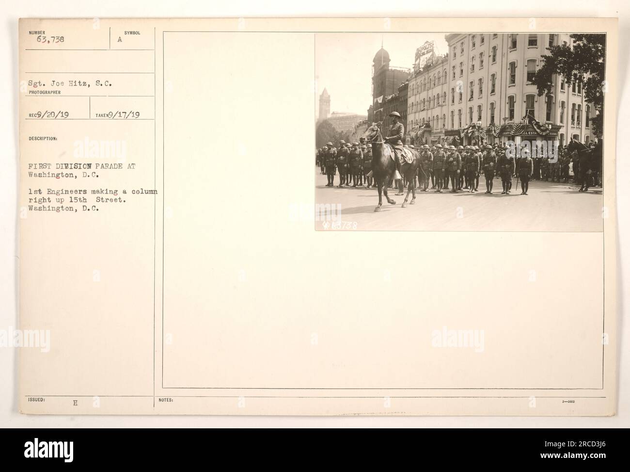 The image depicts the First Division Parade in Washington, D.C. on ...