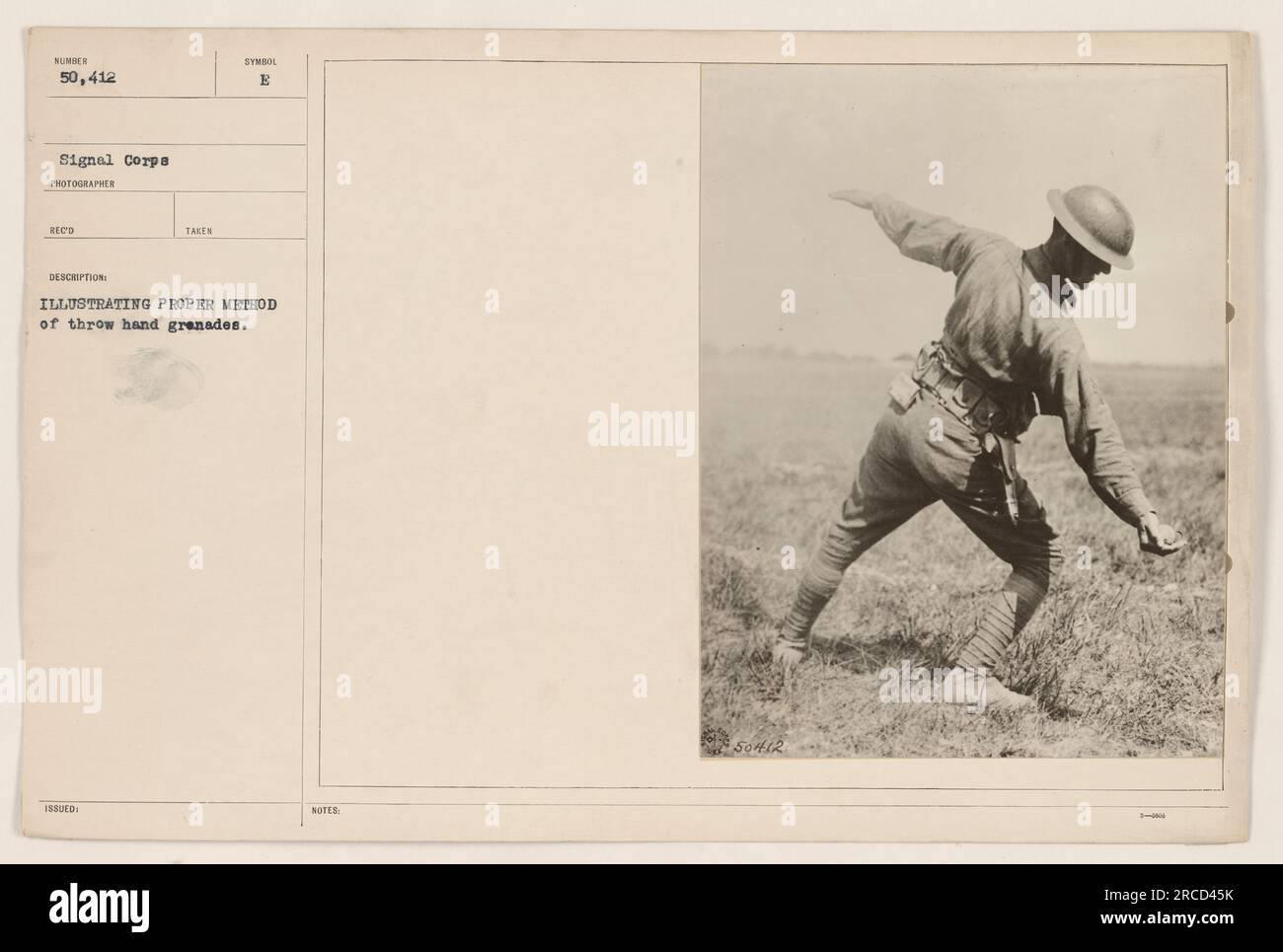 Soldier demonstrating the proper technique for throwing hand grenades ...