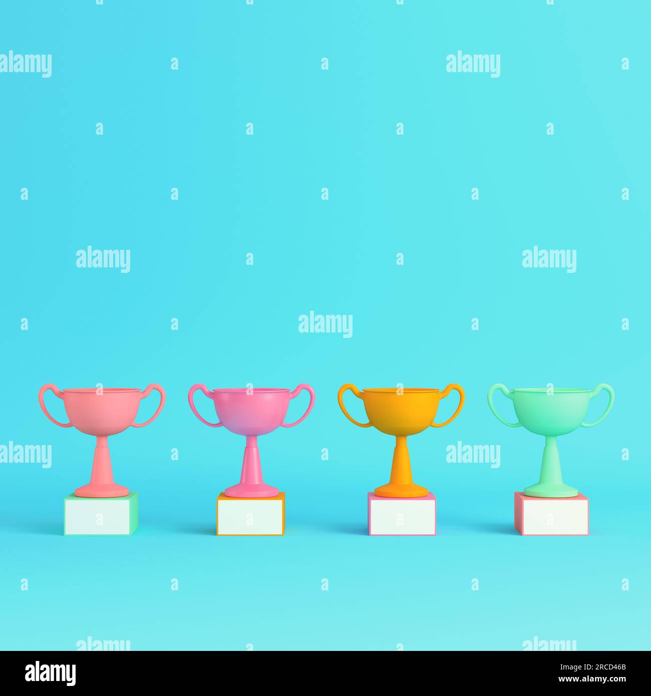 Four colorful trophy cups on bright blue background in pastel colors ...