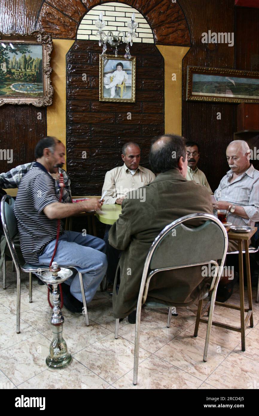 Arab men, smoke a nargileh in a cafe in east, Jerusalem, Israel Stock ...