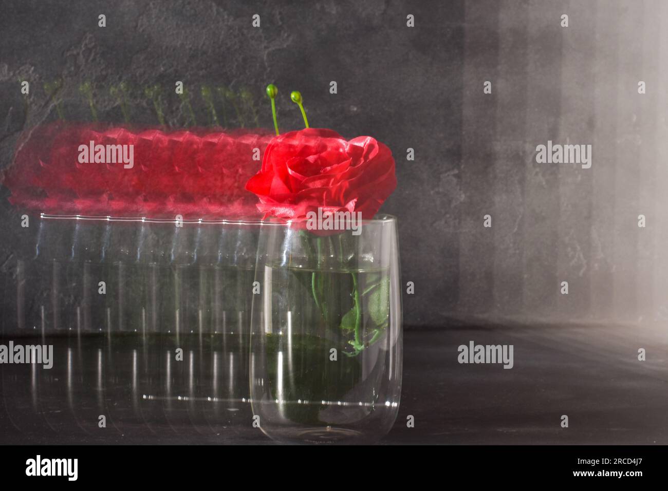 Red rose flower in motion blur. Long exposure concept Stock Photo - Alamy