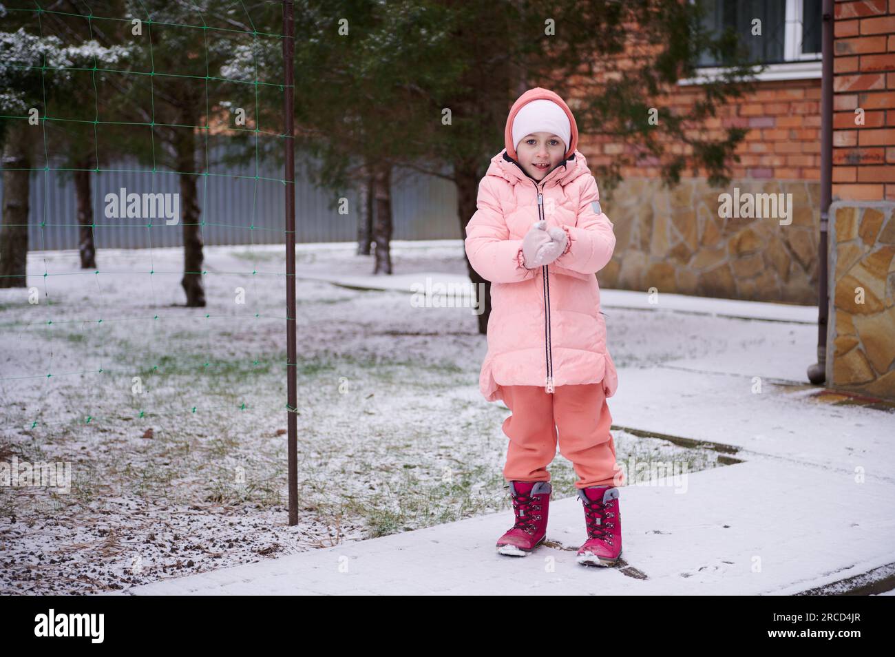 Full-length portrait of adorable little kid girl with rosy cheeks ...