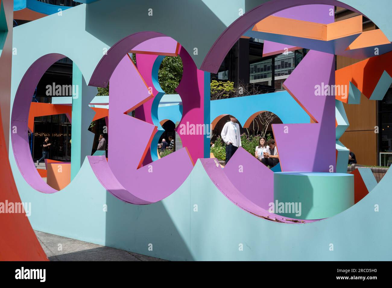 Members of the public occupy the sightlines and curves in artists' Wade ...