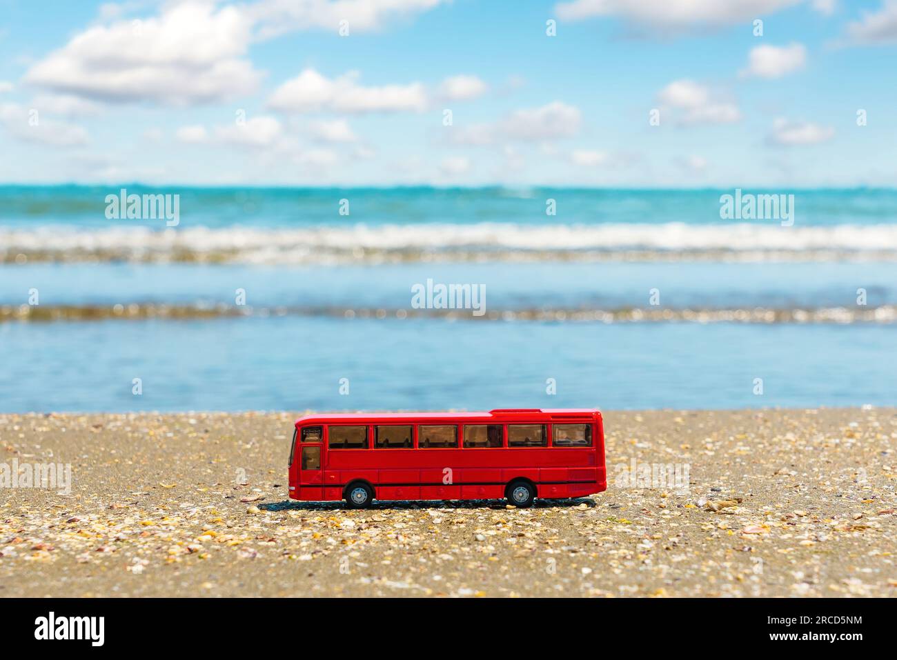 Tourist bus on the sea shore. Summer vacation Stock Photo - Alamy