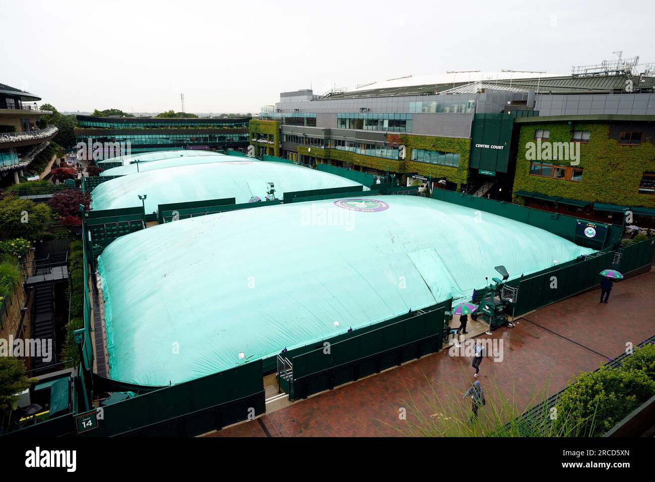 Outside courts are covered on day twelve of the 2023 Wimbledon ...