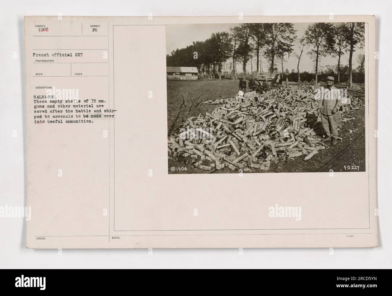 The image shows a group of peasants in Belgium collecting and returning ...