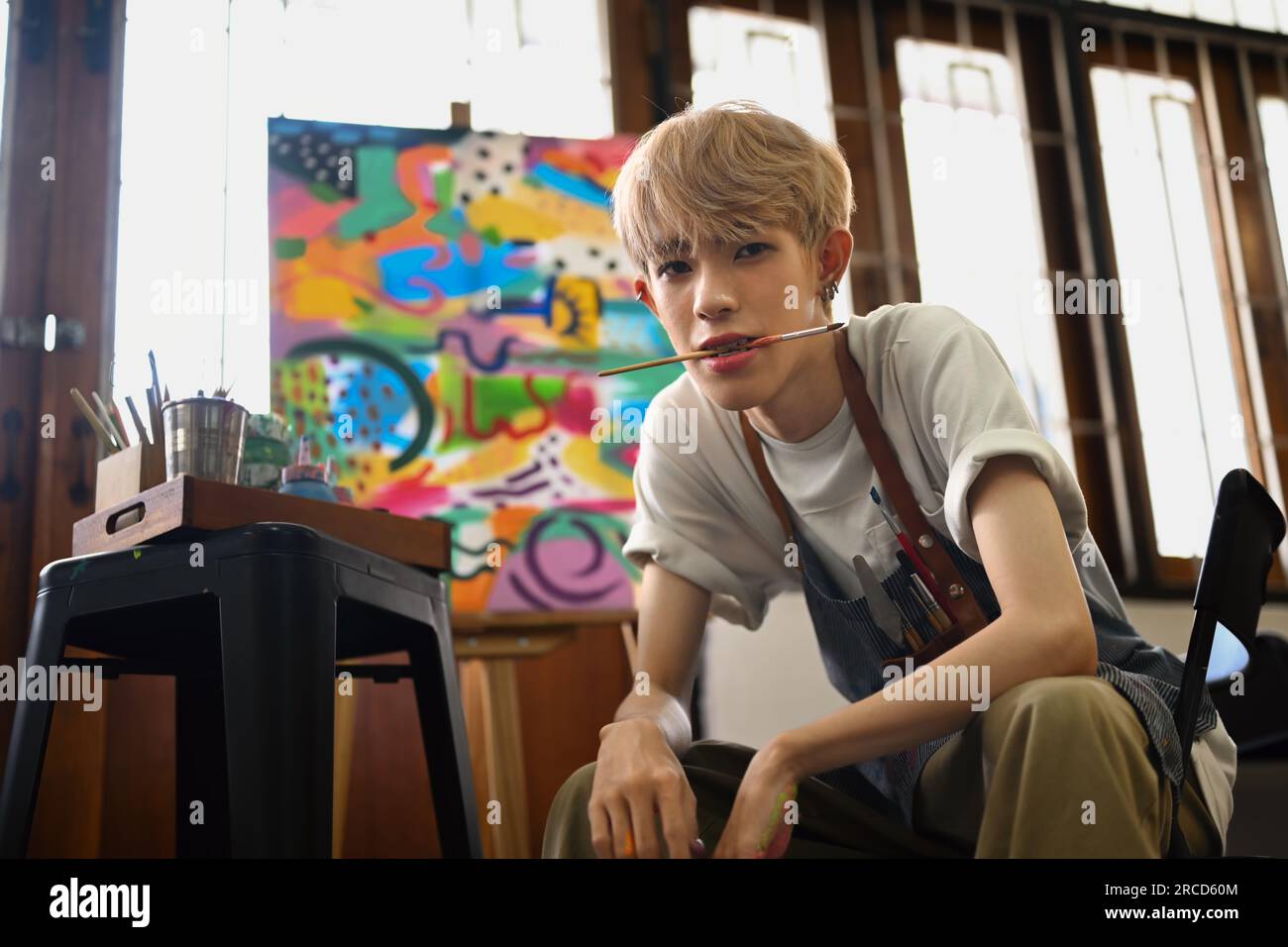 Art, education, creativity and people concept. Asian student man ...